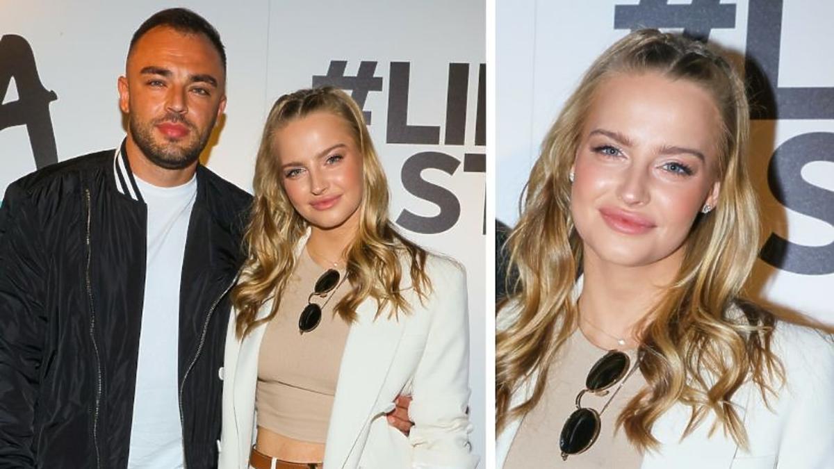 Zadowolona Karolina Pisarek pozuje z mężem na premierze książki ...